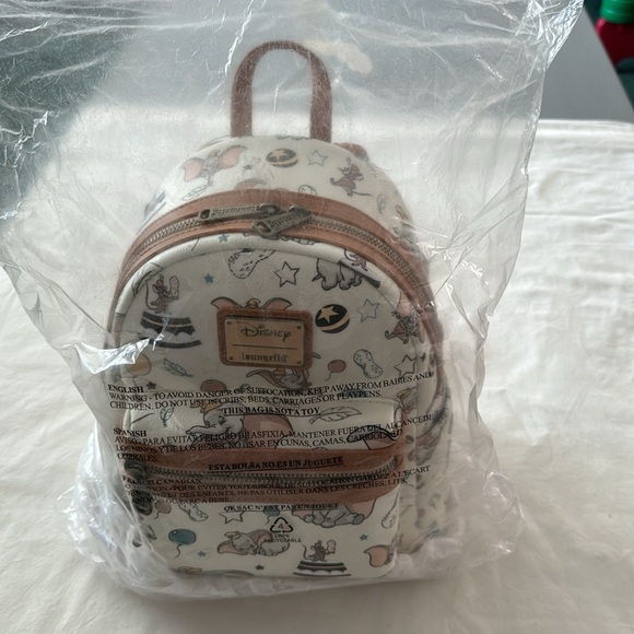 Loungefly | Bags | Loungefly Disney Dumbo Vintage Mini Backpack | Poshmark